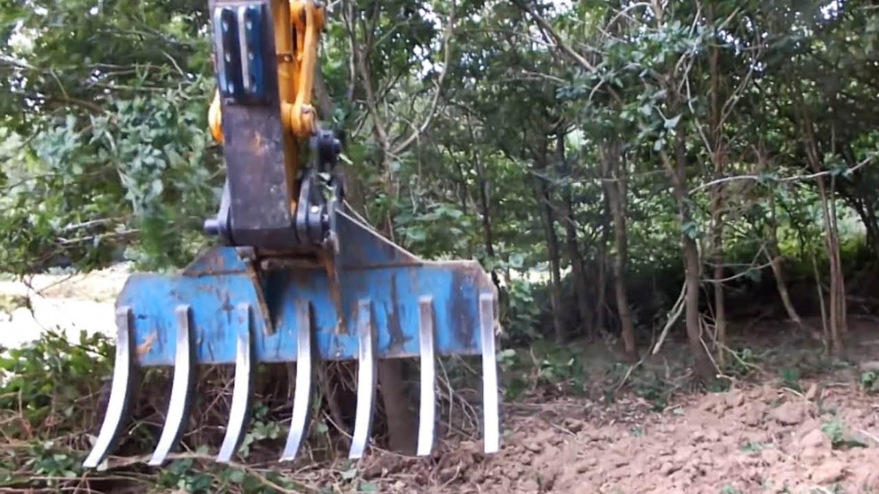 Root Rake or Scoop Rake in Action (Excavator Attachment) - YouTube