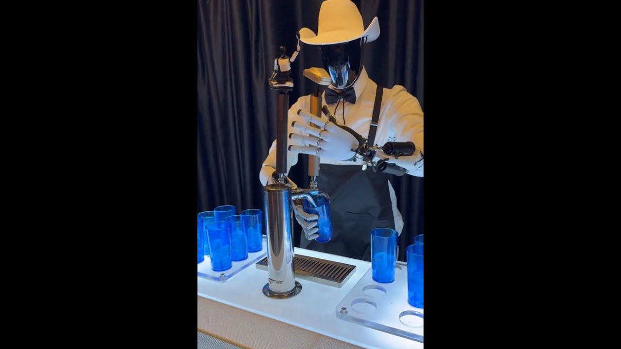 Tesla Bot serving drinks. The future is here! - YouTube