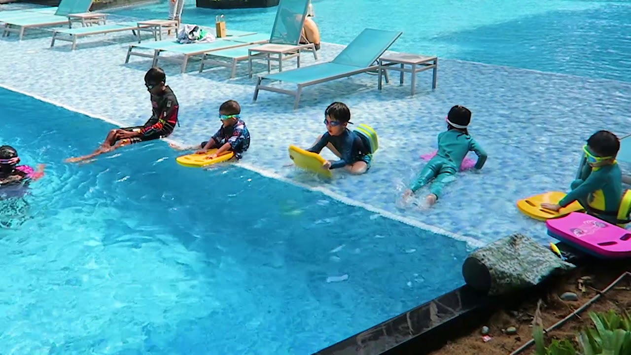 swimming lessons to learn front crawl position, leg action and arm ...