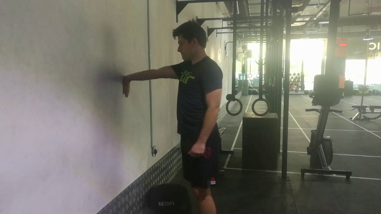 Bicep wall stretch and pulse - YouTube