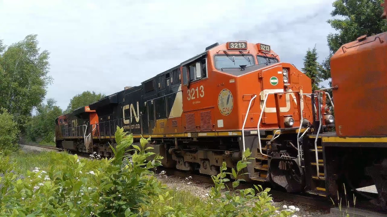 Long Manifest Train CN 305 w/EMD Geep & DPU Rolling thru Berry Mills, NB - YouTube