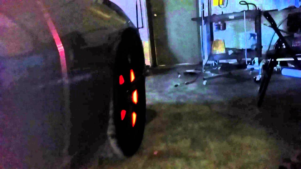 My red reflective vinyl I added to my calipers and wheels. - YouTube
