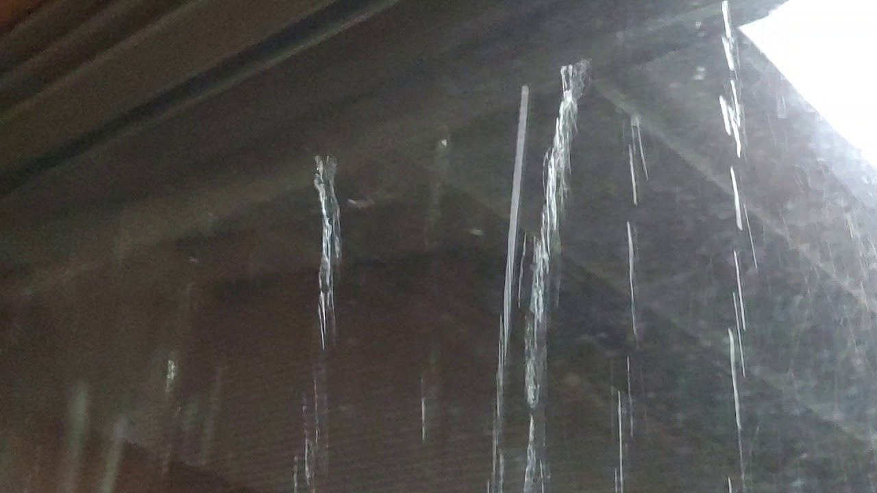 Leaf filter gutter overflow after repair! - YouTube