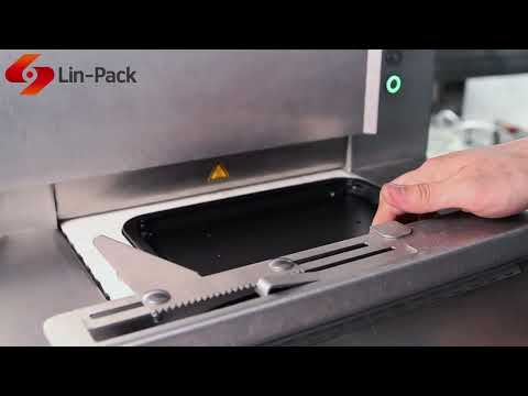 Tray sealing machine linpack - YouTube