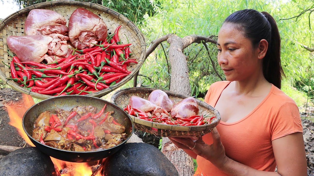 Survival cooking in forest: Pork heart curry Spicy delicious with Chili ...