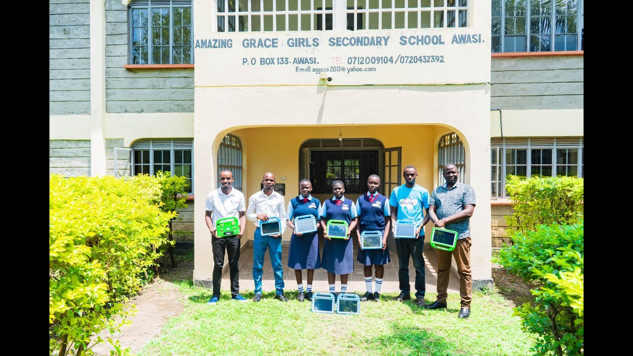 Introducing our tablets at Amazing Grace Girls Secondary School Awasi ...