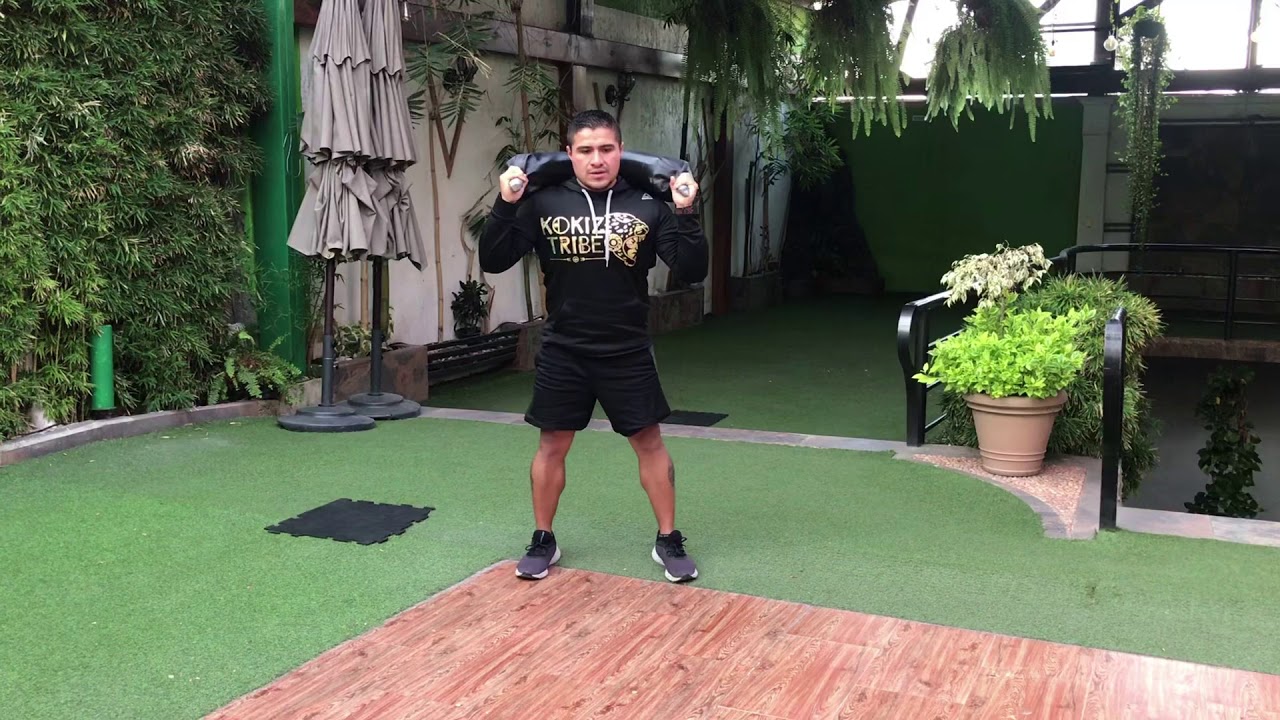 Back squat with sandbag - YouTube