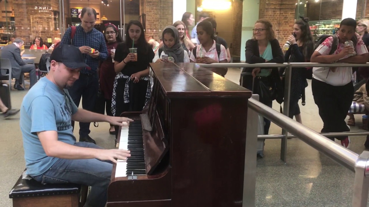 André Youssef playing some blues at the public piano in London St ...
