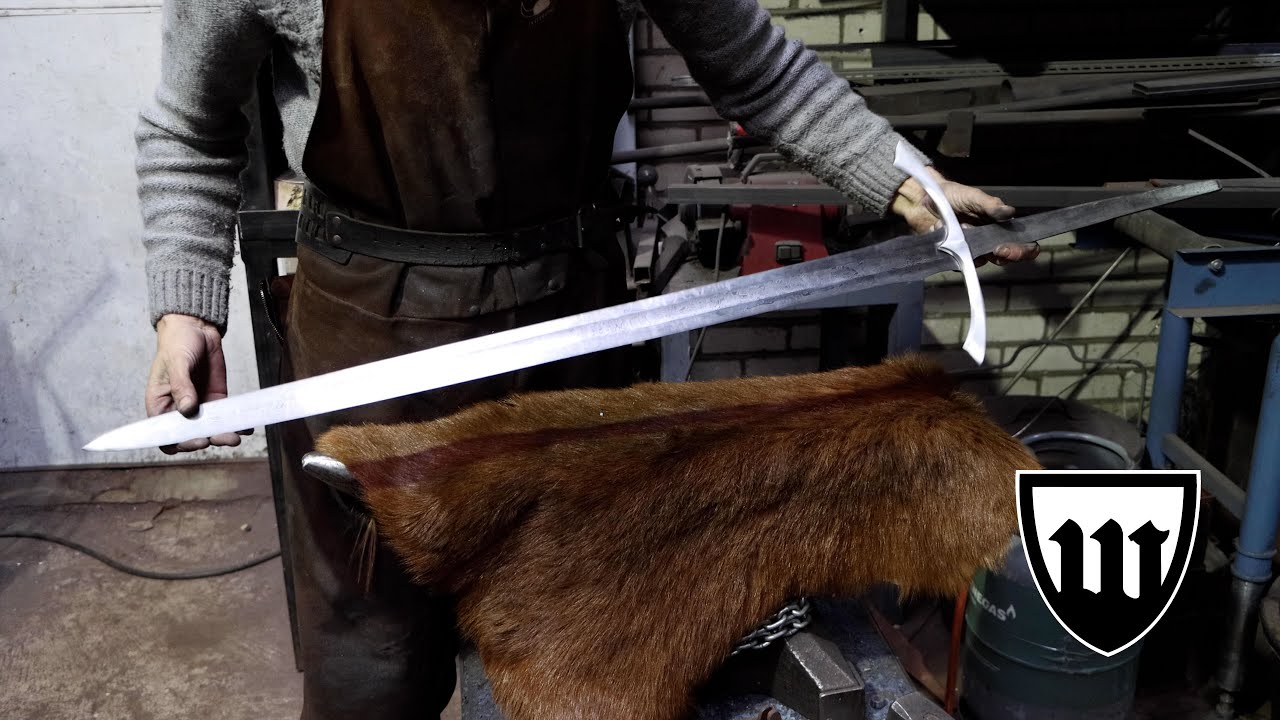 Forging a pattern welded longsword, part 3, making the guard. - YouTube