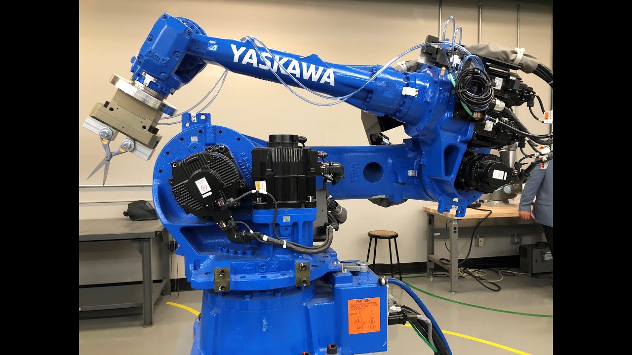 Robot Cuts Ceremonial Ribbon - YouTube