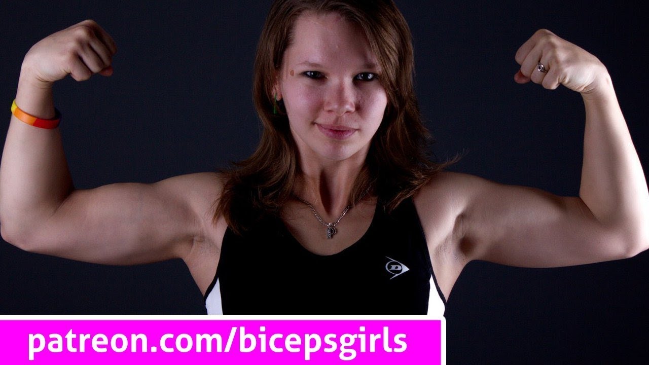 Muscle girl Patricia flexing her biceps and armwrestling with girl ...