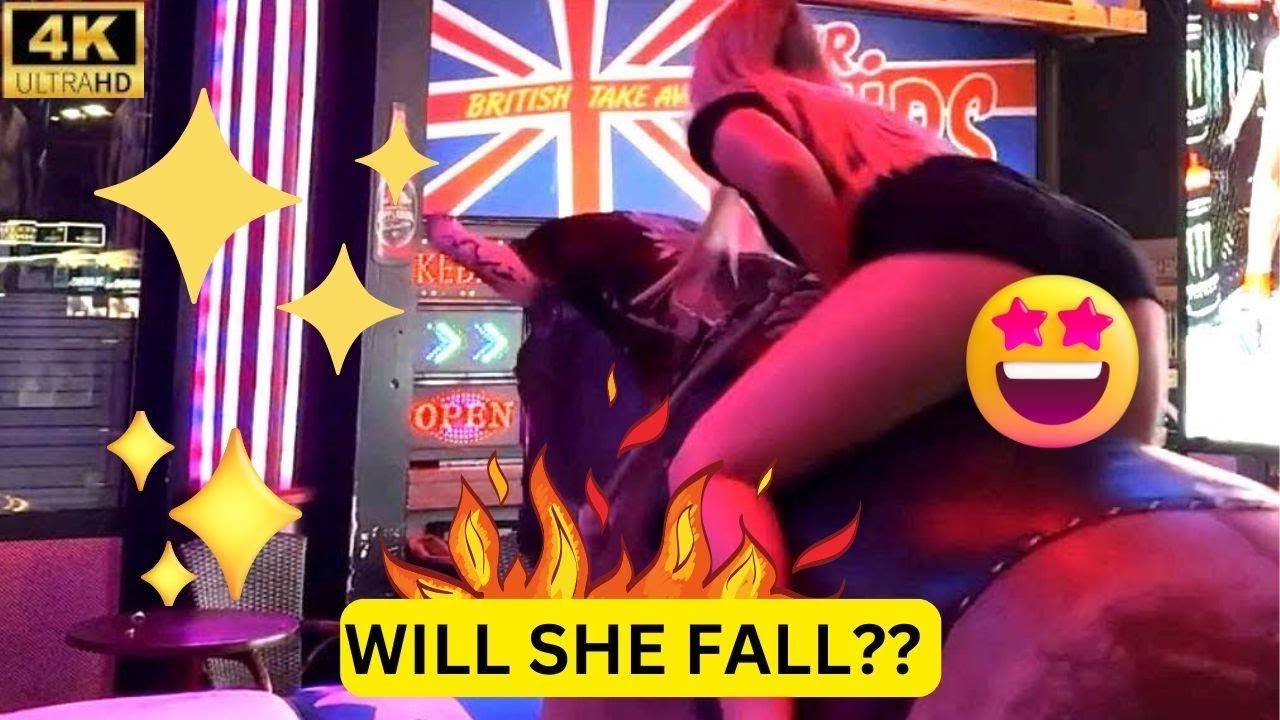 😍HOT Girl With Short Dress Rides Mechanical Bull Benidorm Spain # ...