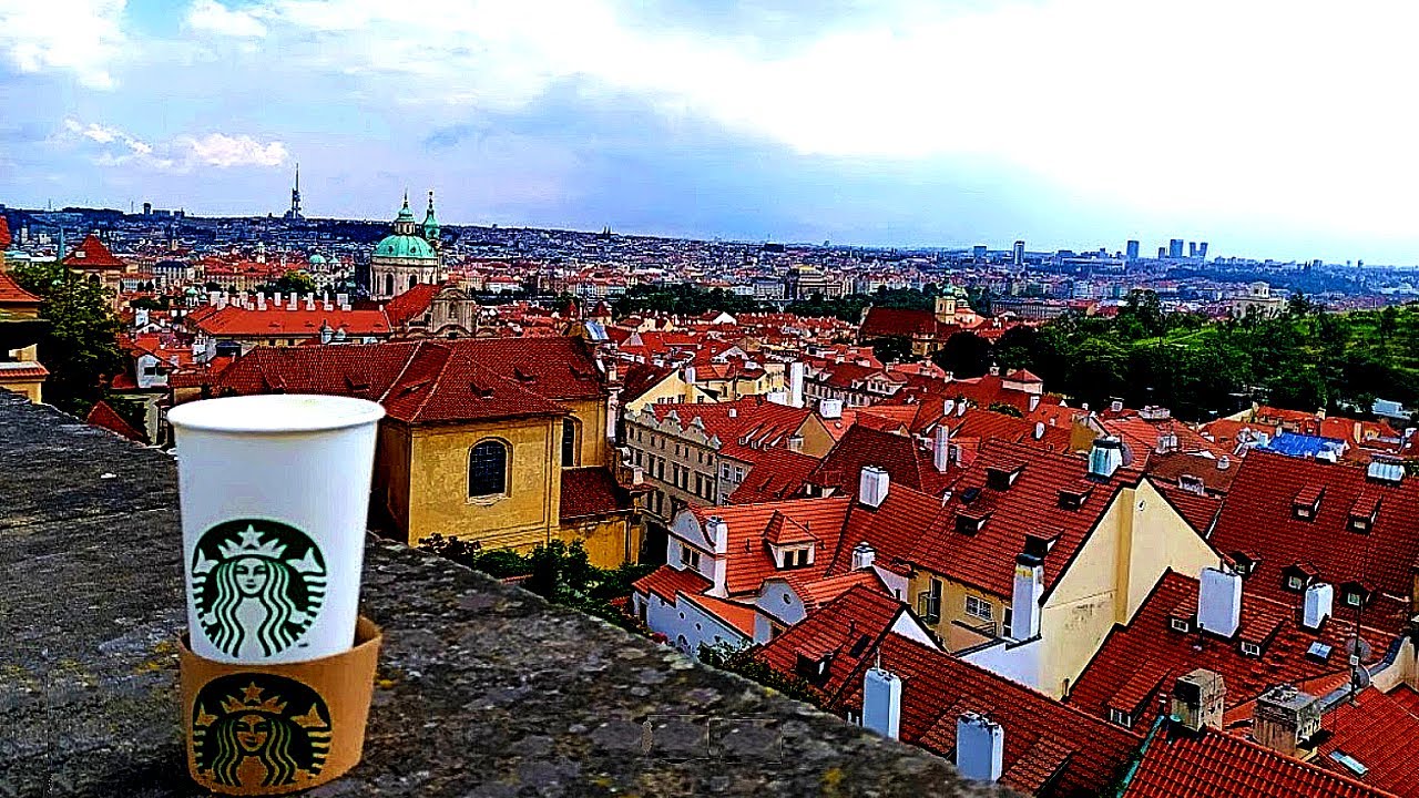 Beautiful city view from Starbucks Cafe in Prague with rain sounds and ...