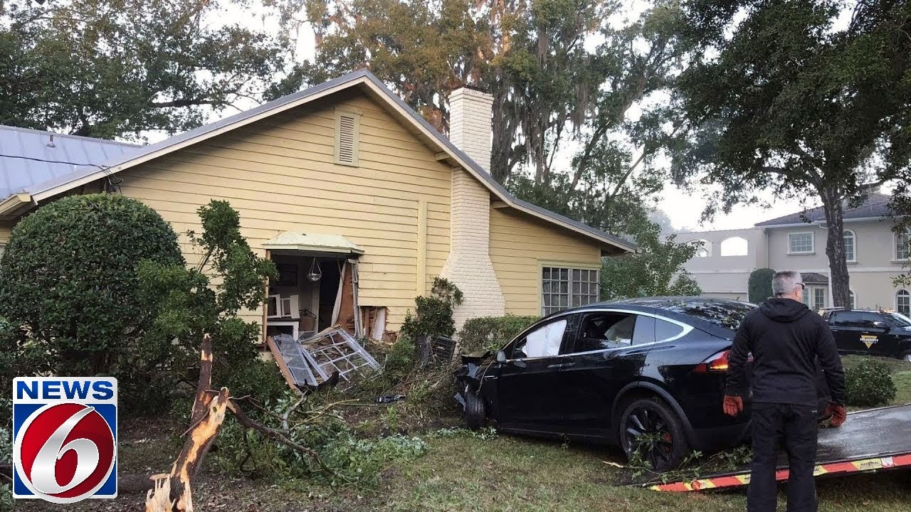 Tesla crashes into home on Bryan Avenue in Winter Park - YouTube