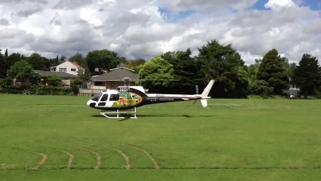 Helicopter lands at school - YouTube