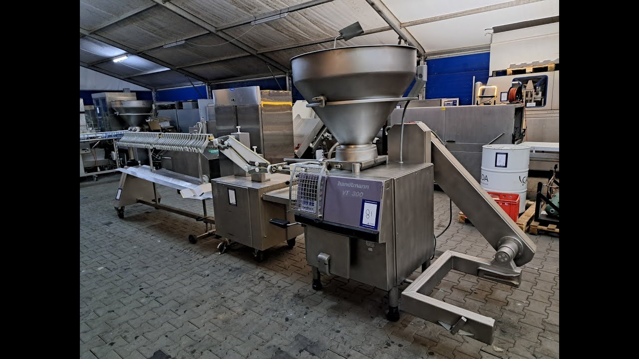1104-300: Handtmann vacuum filling and linking line - YouTube