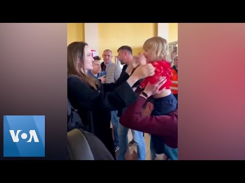 Angelina Jolie Tickles Little Girl During Visit to Lviv