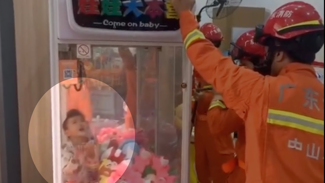 Boy trapped inside claw machine rescued - YouTube