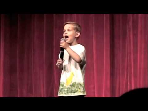 Little kid singing "Proud To Be An American" - YouTube
