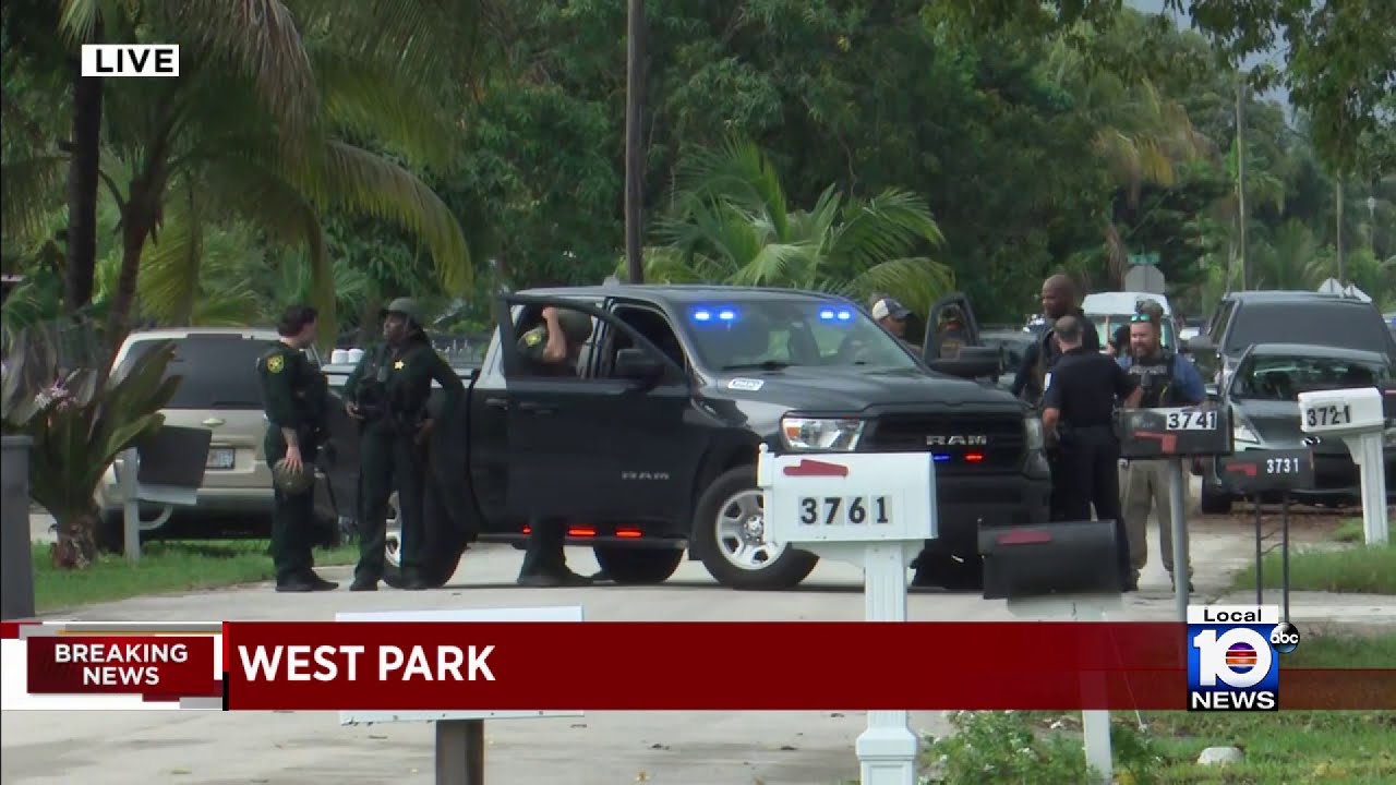 SWAT team surrounds house in West Park - YouTube