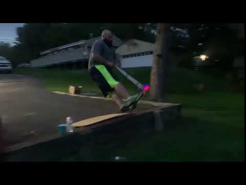 Man Riding Scooter Crashes And Falls While Attempting Jump Off Ramp ...