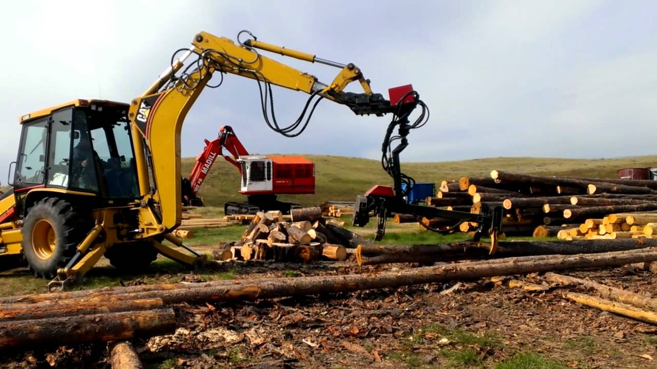 Arbro stroke harvester 400; on cat 430D - YouTube