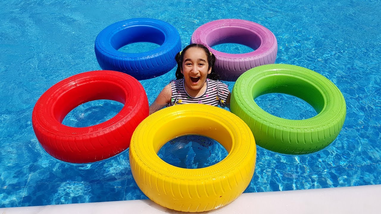 Kids playing with colored wheels in the pool, Fun kid video - YouTube