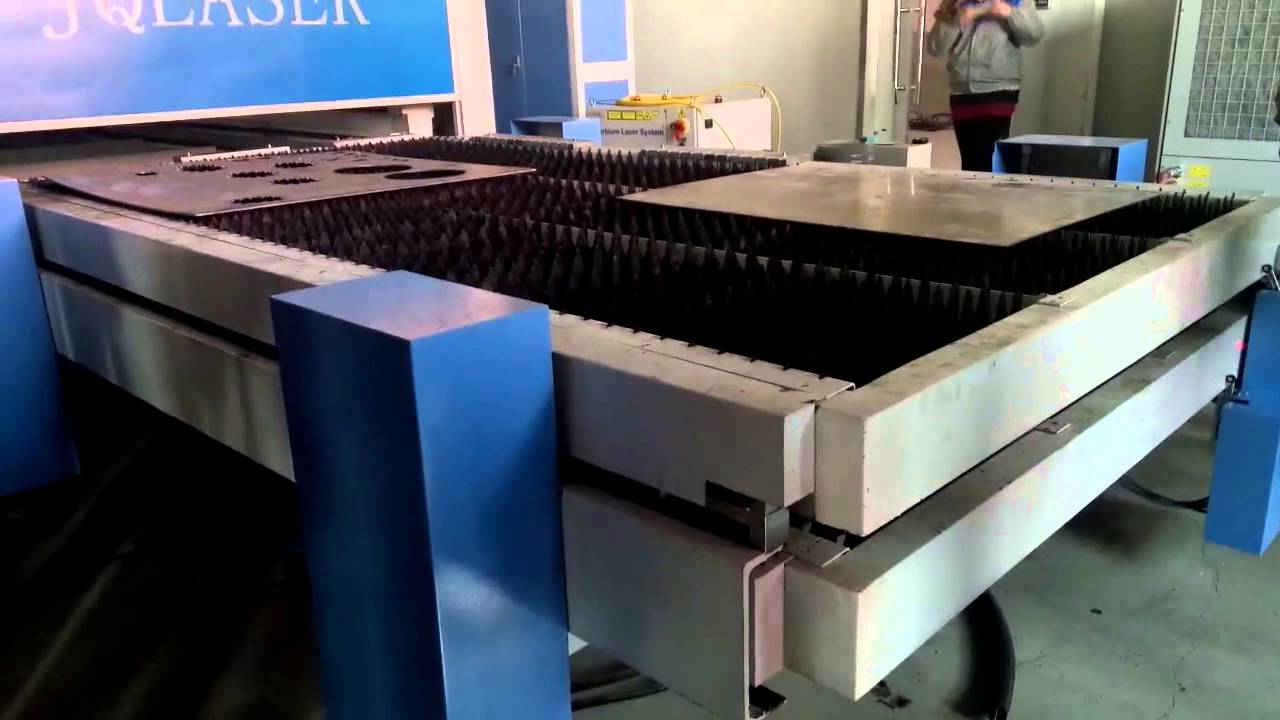 Exchange-table Two tables working of fiber laser machine - YouTube