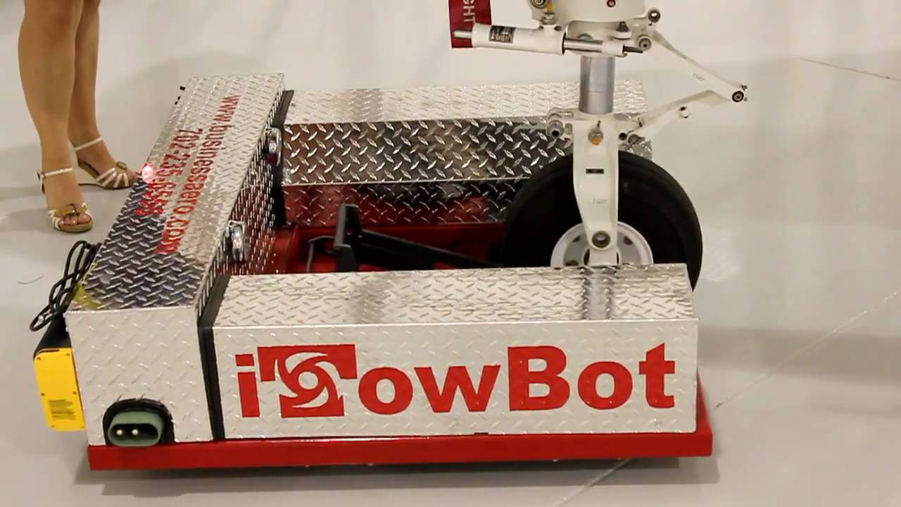 Towbot Loading Phenom 300 - YouTube