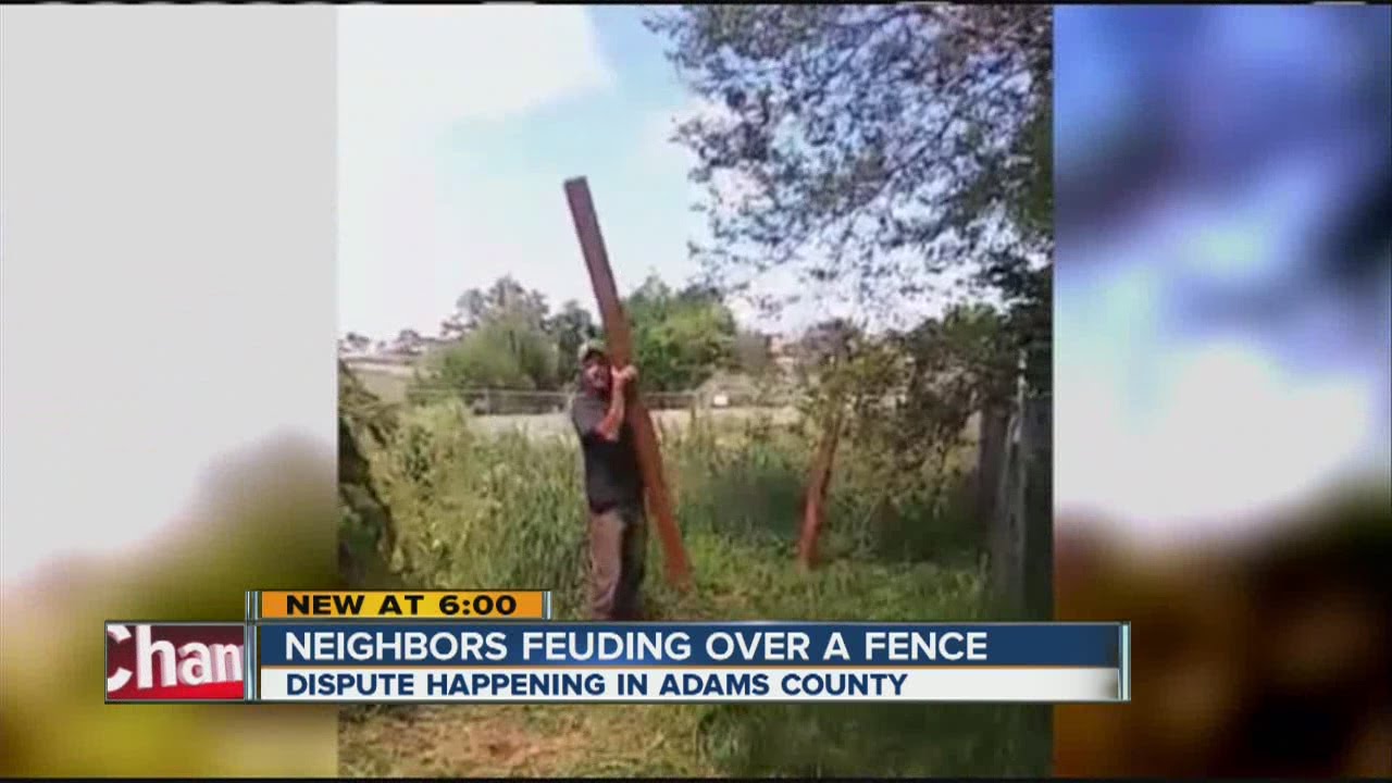 Neighbors feuding over a fence in Adams County - YouTube