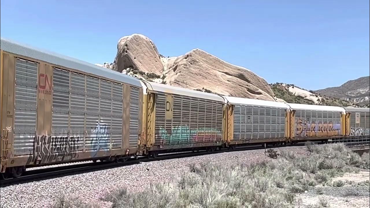 UP 4412 leads an MNPML down Cajon Pass - YouTube