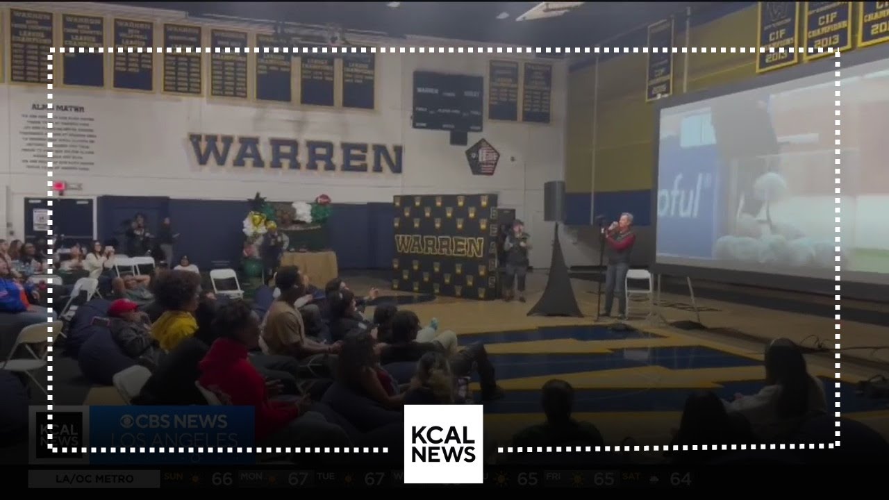 Warren High School football players react to seeing their head coach in ...