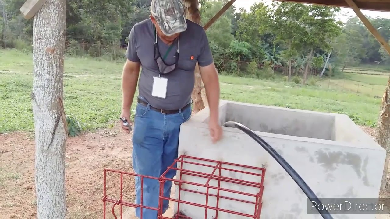 PROGRESS ON THE DEEPWELL/BUILDING CAGE FOR PUMP - YouTube