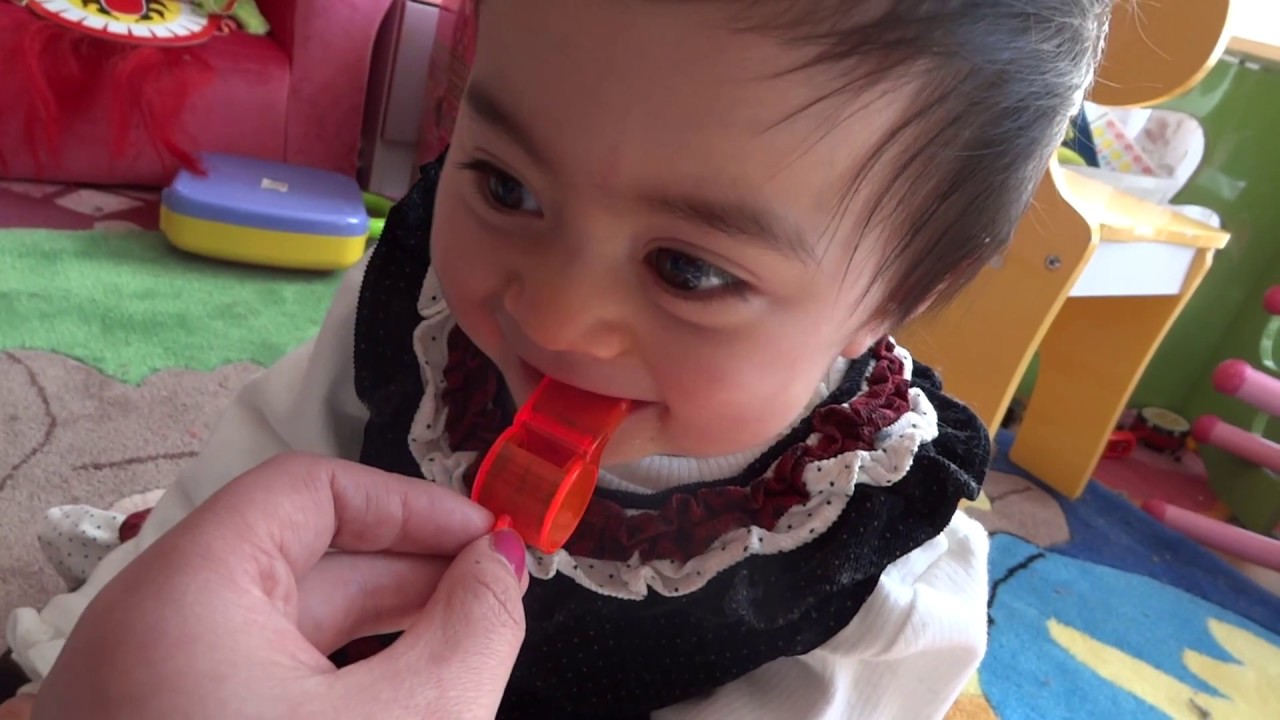 9 months old cute baby blows whistle - YouTube
