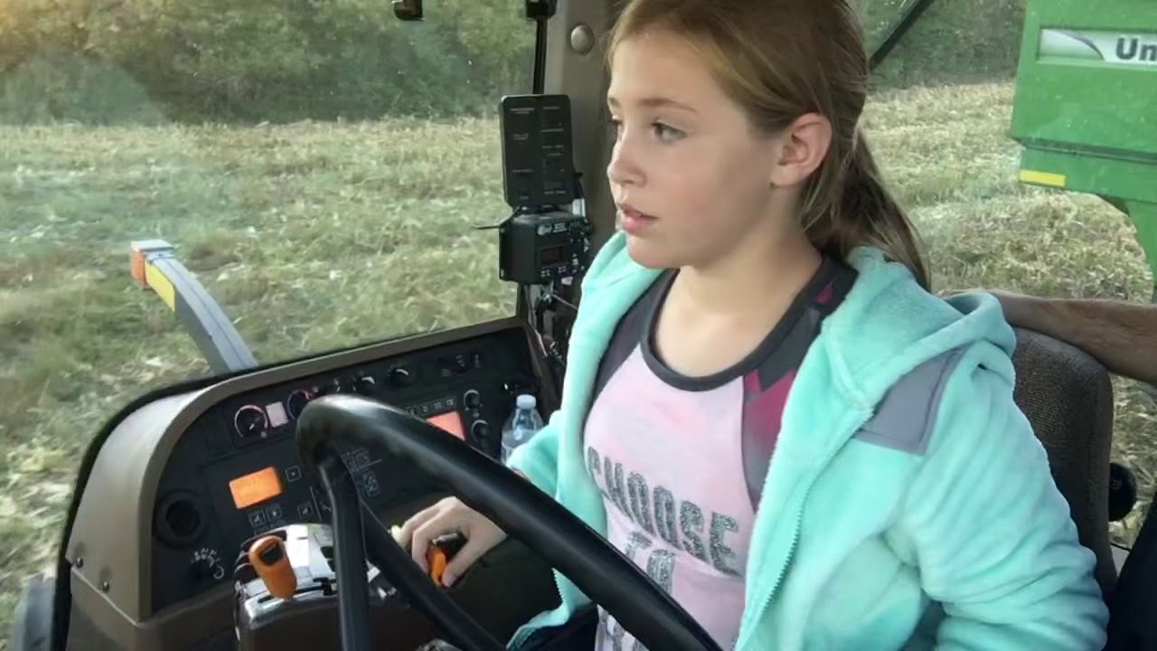 Ava driving tractor and grain cart 2019 - YouTube
