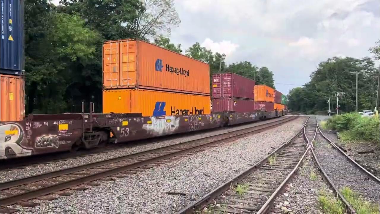 NS 4211 AC44C6M leads NS 269 at Piscataway,NJ with a friendly crew - YouTube