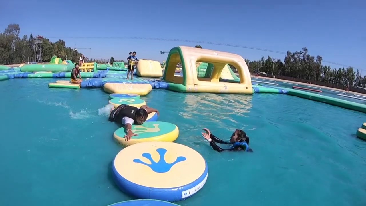 INFLATABLE WATER OBSTACLE COURSE - YouTube