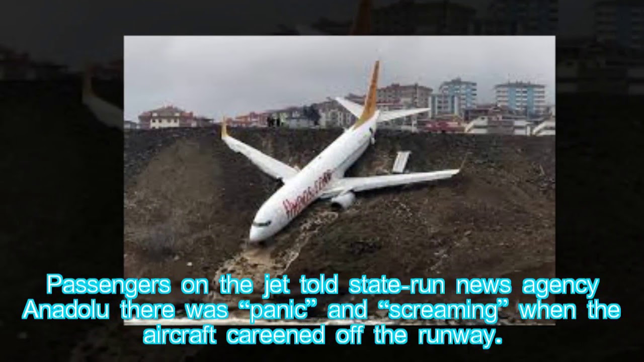 Passenger plane skids off airport runway, dangles off cliff edge - YouTube