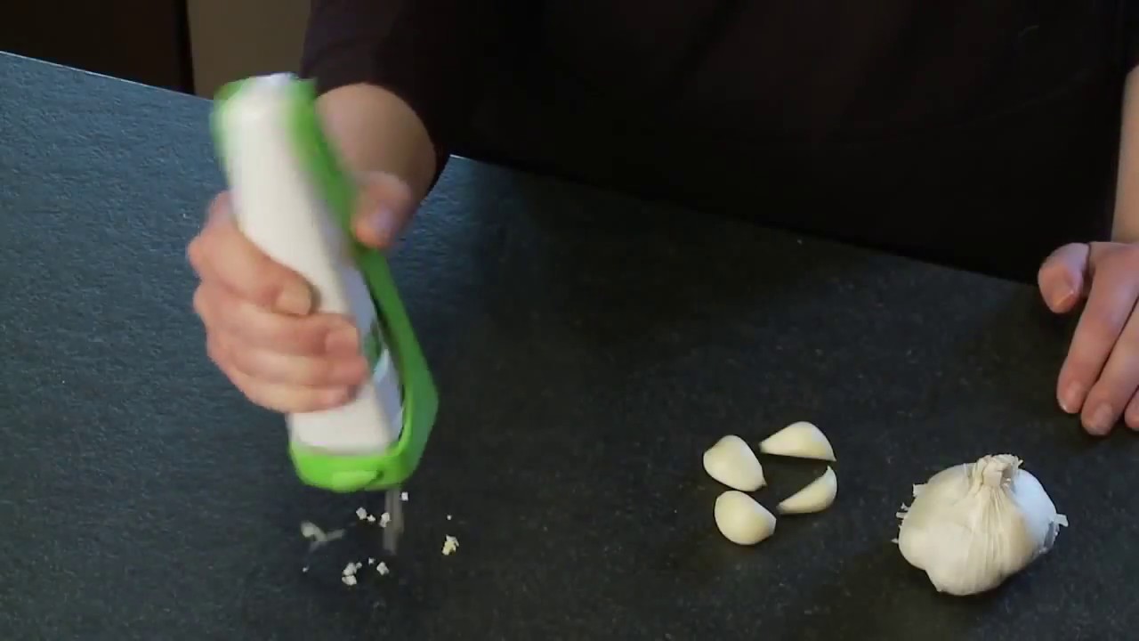 Automatic garlic press - YouTube