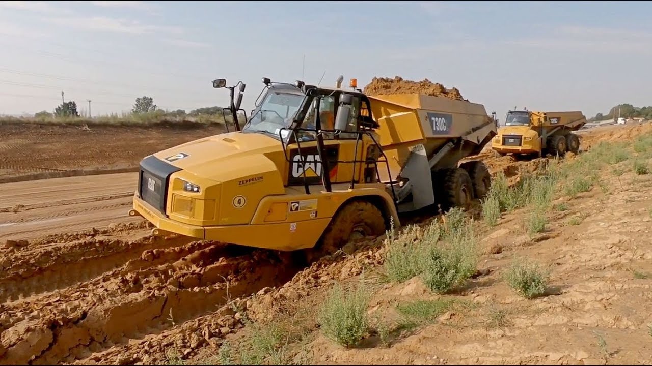 Cat 730C2 dumper in extreme - YouTube