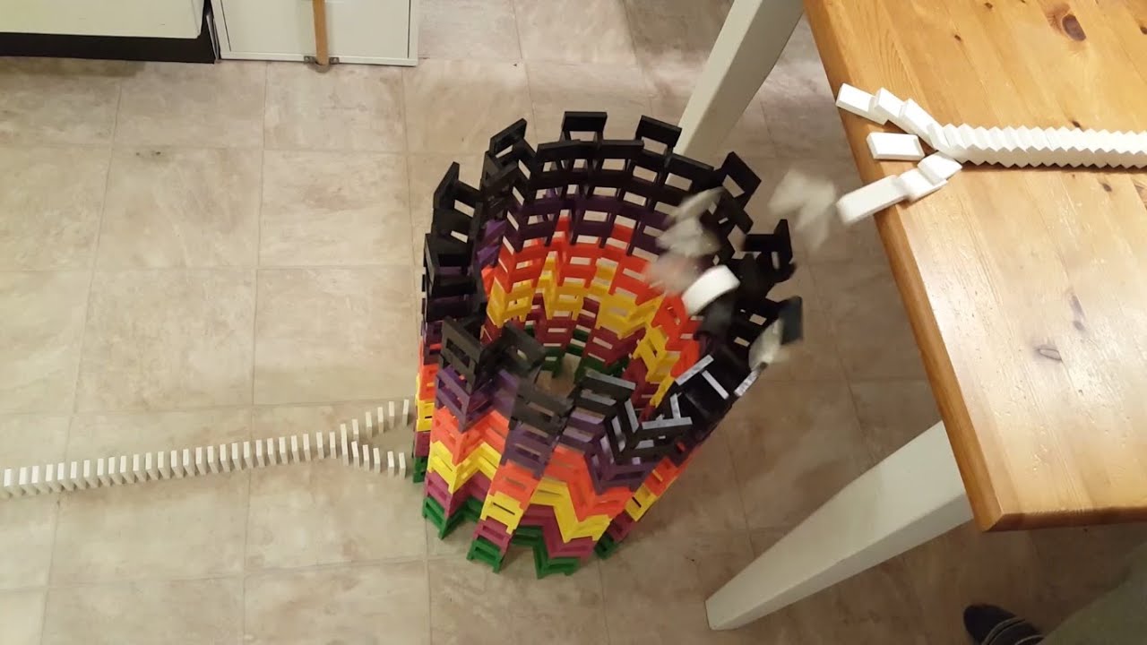 Domino structures in reversed slow motion - YouTube