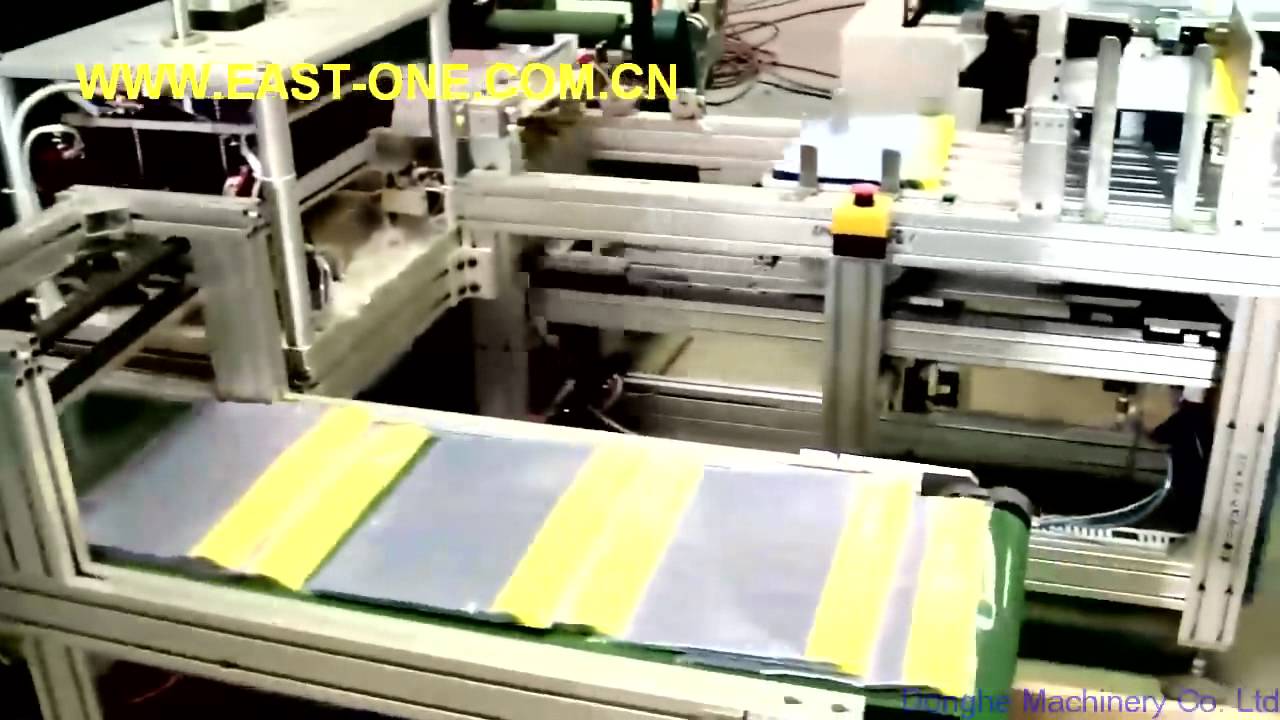 Donghe Flat File making Machine_1 of 2_0.rmvb - YouTube