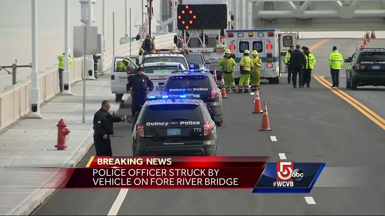 Police officer struck by vehicle on bridge - YouTube