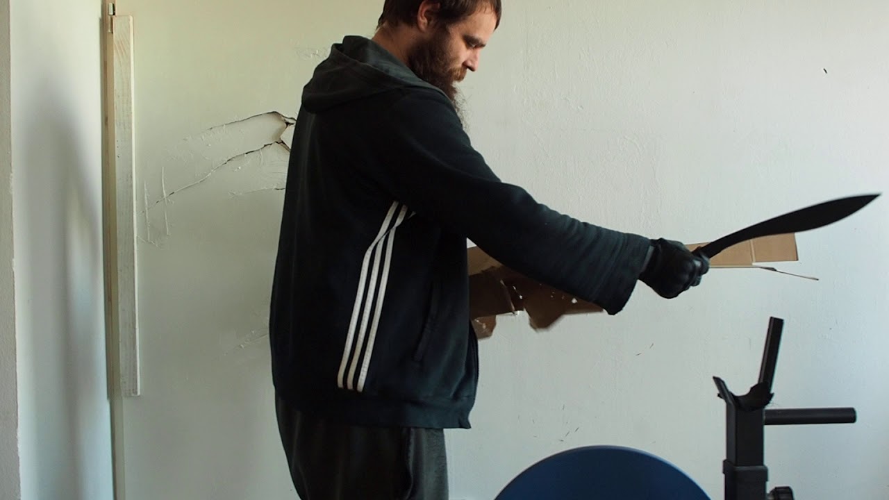 Using a machete on carton - YouTube