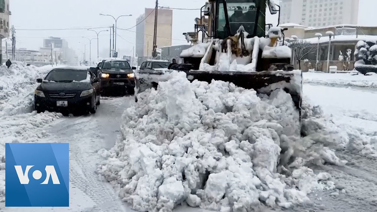 Storm Blankets Jordan in Snow - YouTube