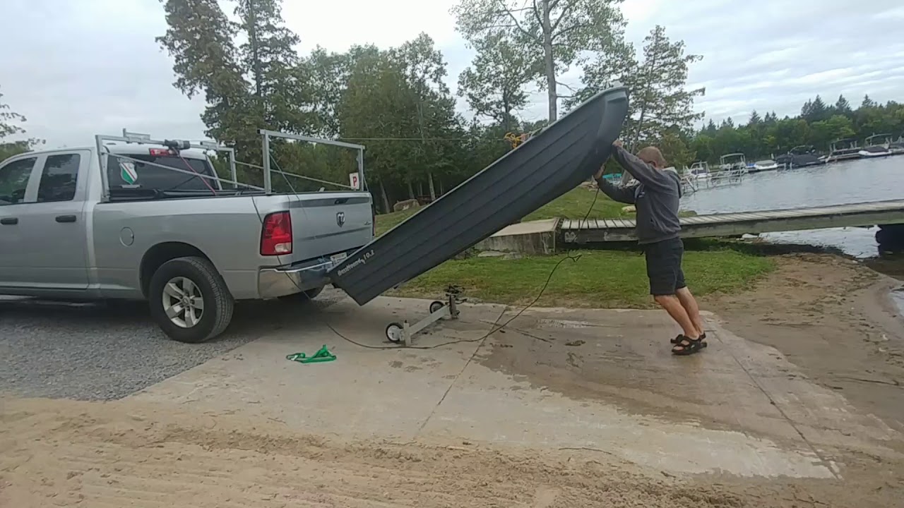 Loading boat onto my car roof - YouTube