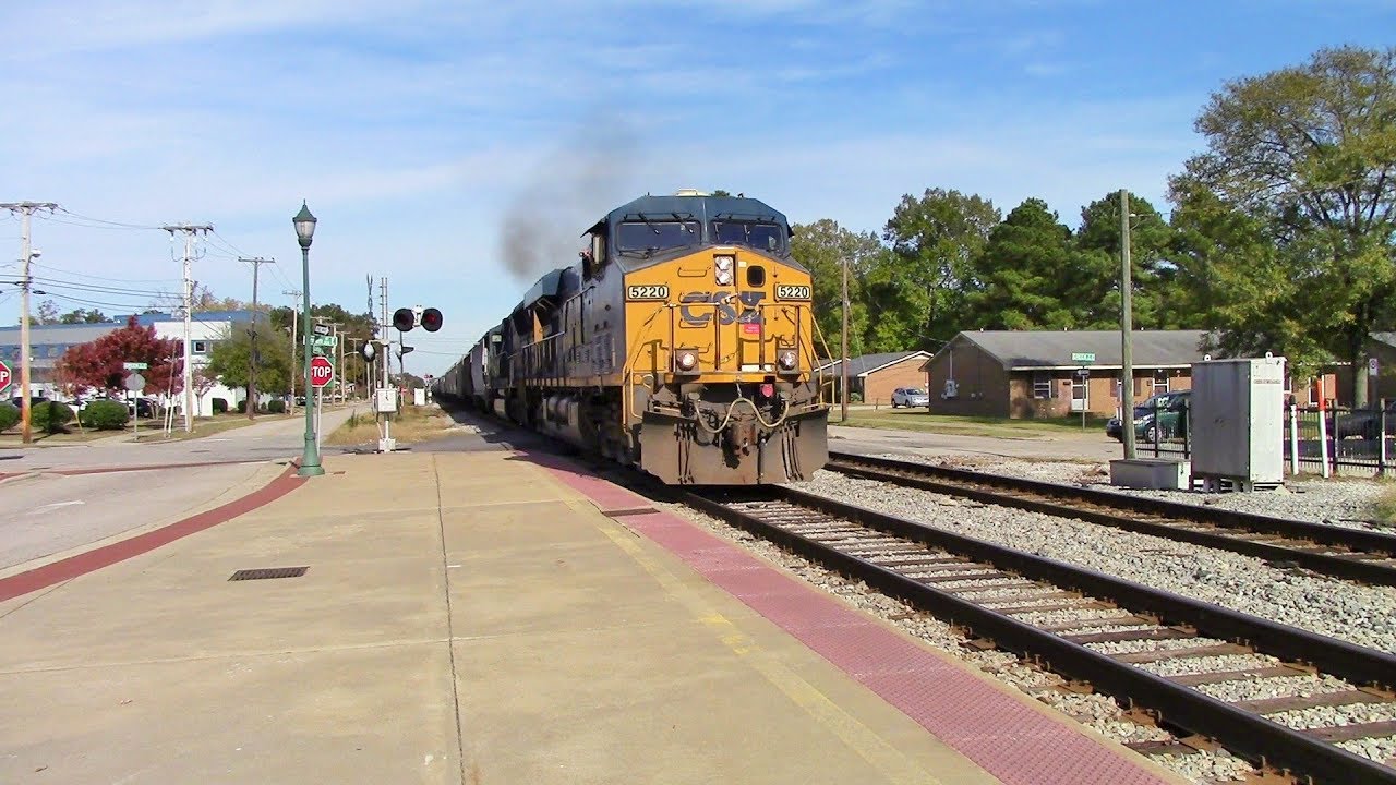 CSX G965 ES40DC with K5LA Horn leads an SD70MAC & F732 GP38-2 Horn ...