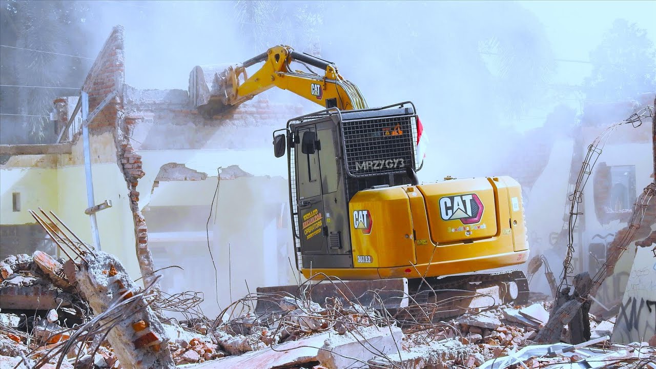House Demolition With A CAT Mini Excavator - YouTube