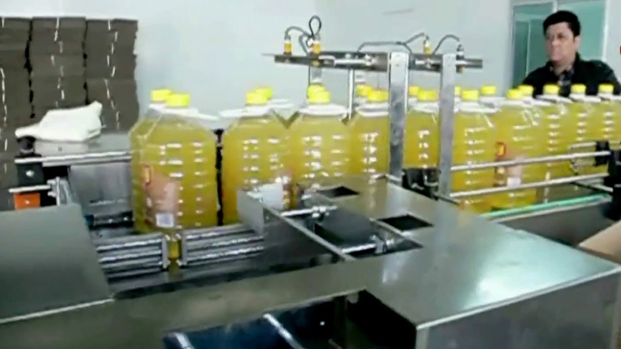 soybean oil bottles feeding cartoning packaging line fully automated ...