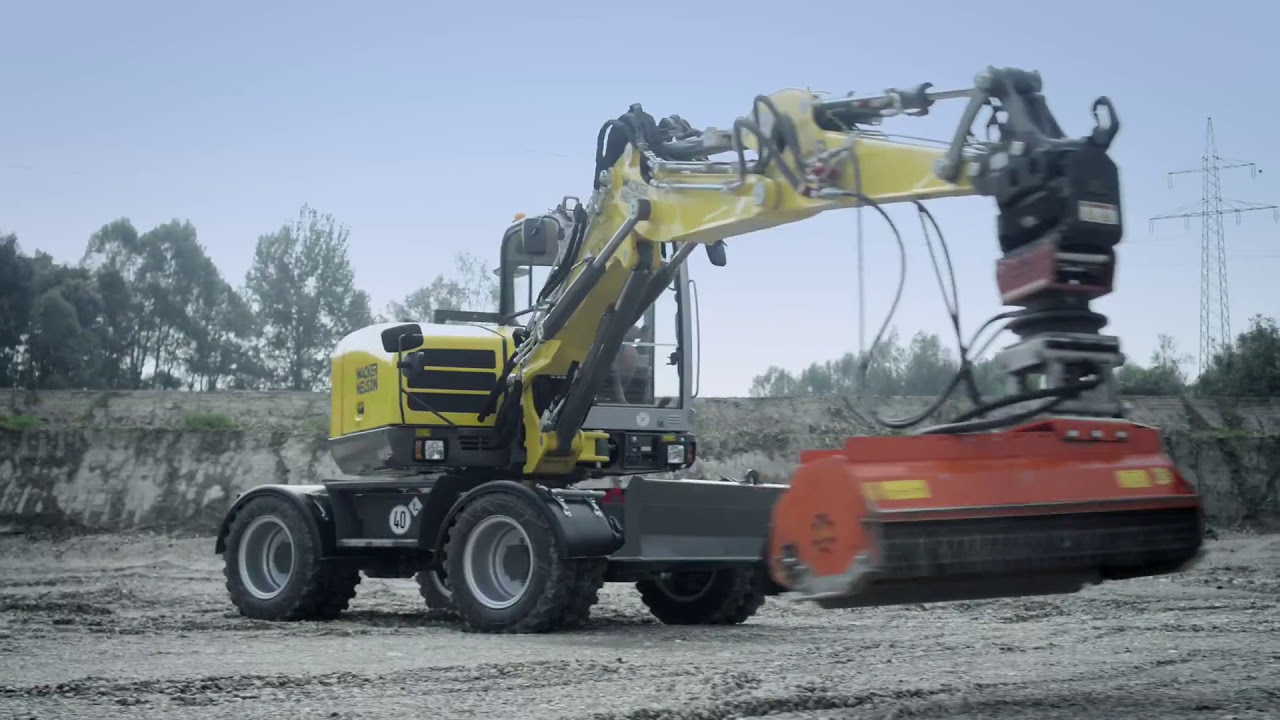 01 Wacker Neuson Wheeled Excavator EW100 - YouTube